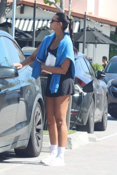 April Love Geary Wearing A Black Mini Dress While She Is Out Shopping In Malibu Famousfix